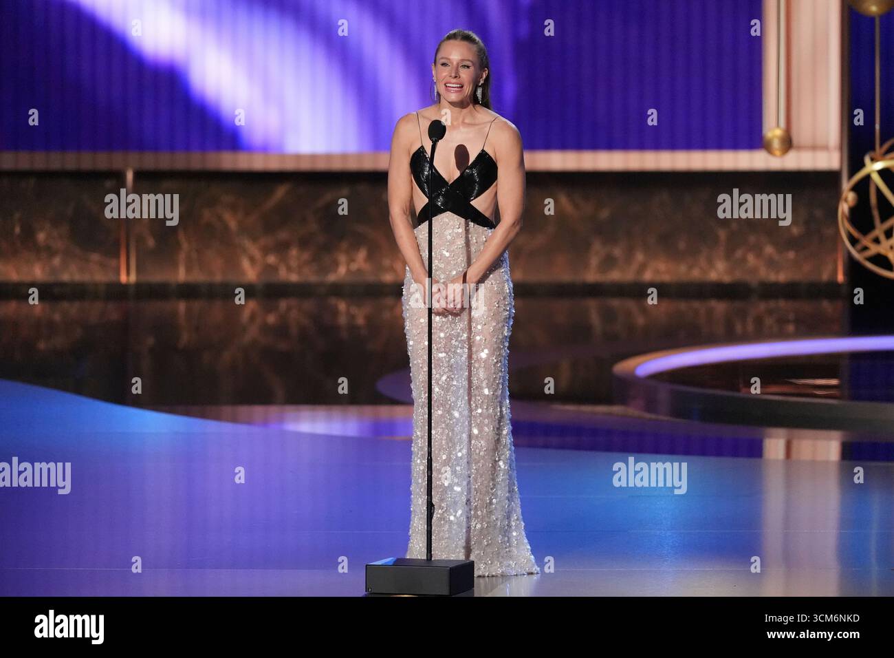 Kristen Bell presents the Bob Hope humanitarian award during the 77th ...