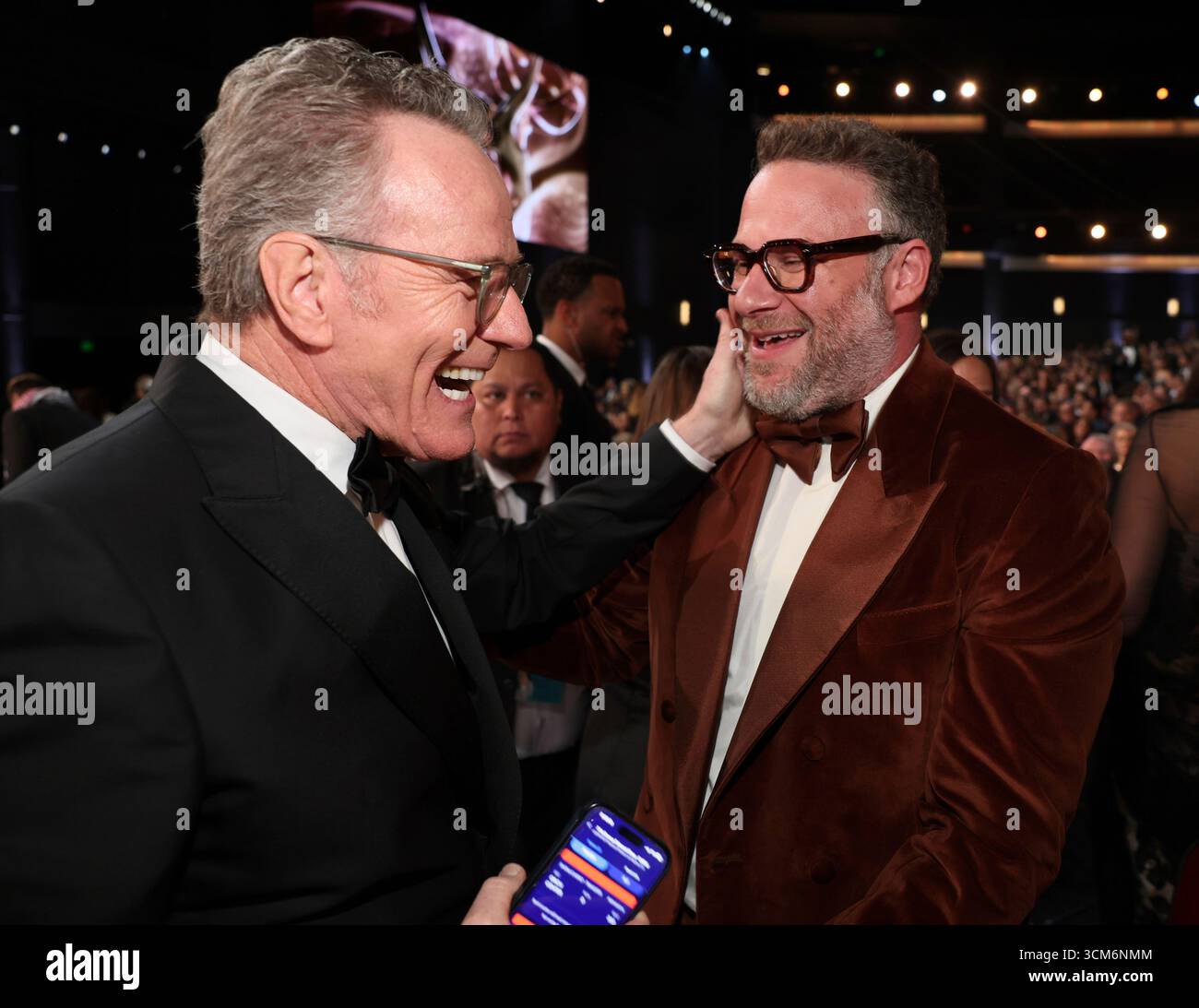 Bryan Cranston, left, and Seth Rogen at the 77th Emmy Awards on Sunday ...