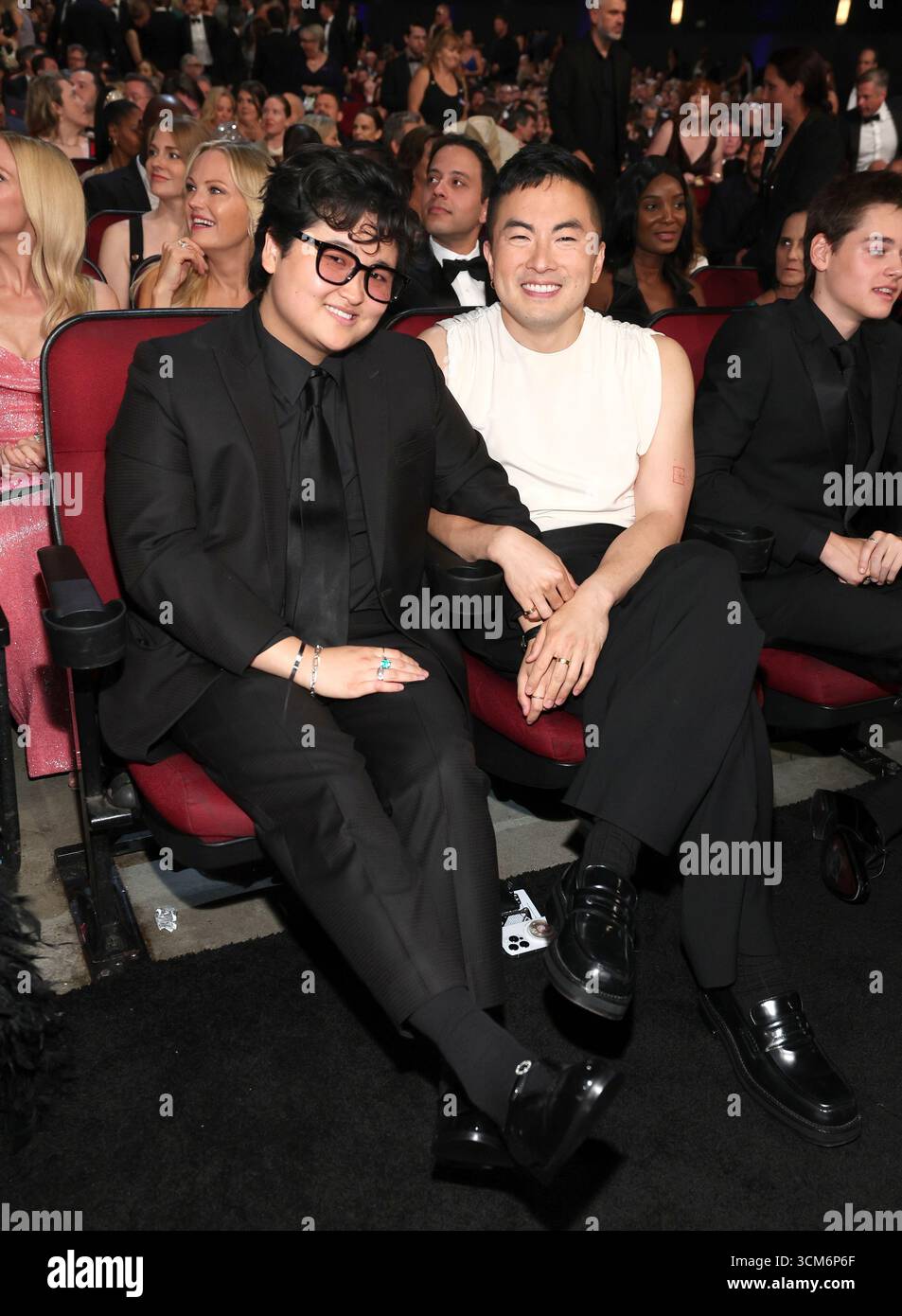 Celeste Yim, left, and Bowen Yang at the 77th Emmy Awards on Sunday ...