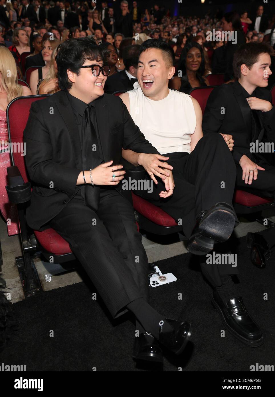Celeste Yim, left, and Bowen Yang at the 77th Emmy Awards on Sunday ...