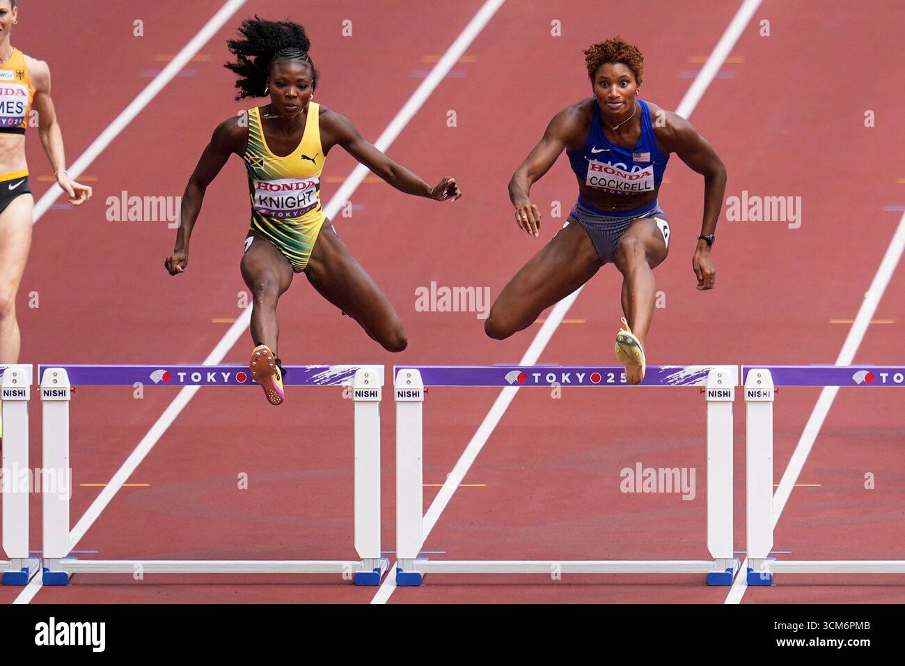 United States' Anna Cockrell and Jamaica's Andrenette Knight, left ...
