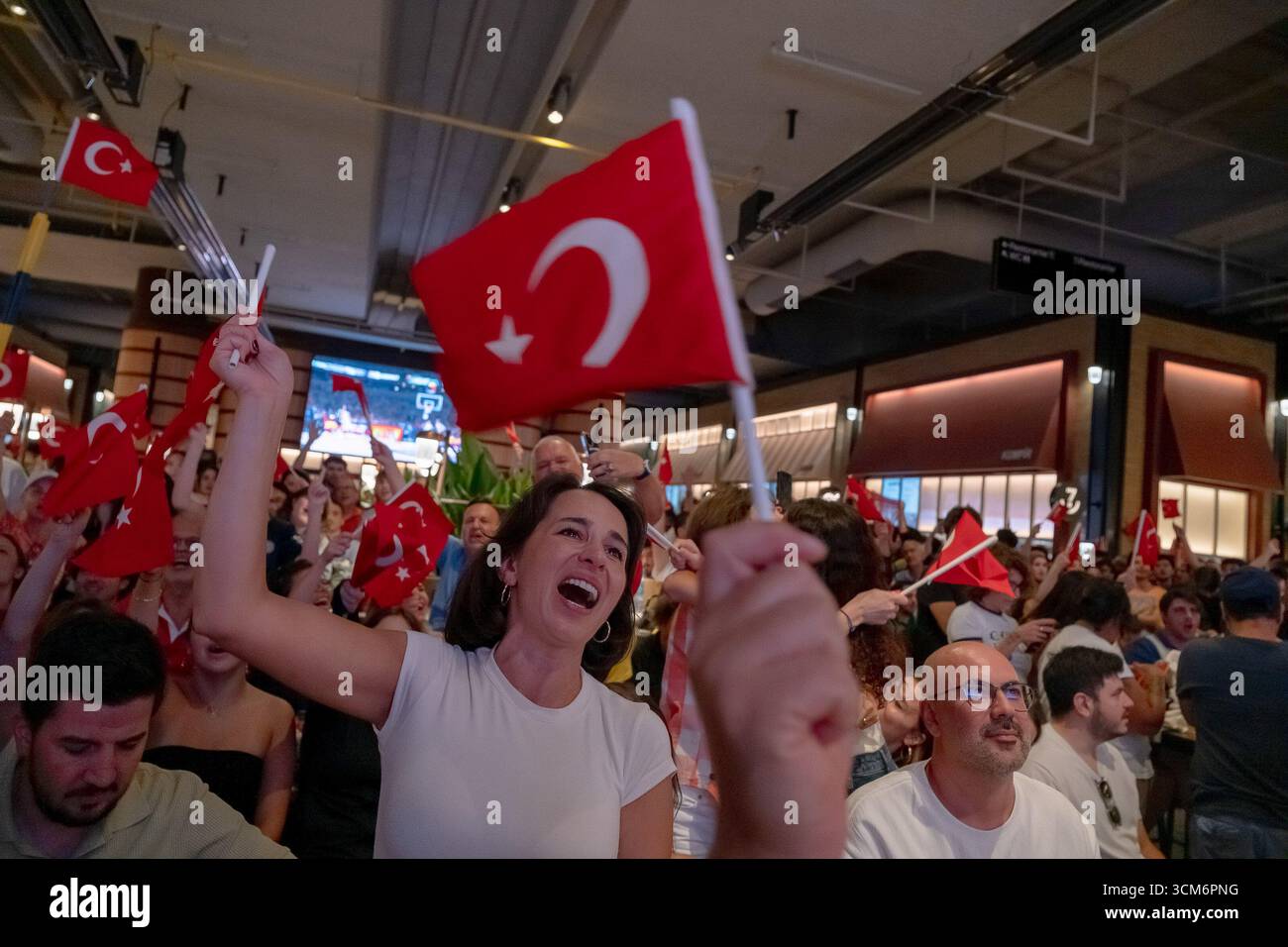 Turkish fans are seen following the match with great enthusiasm. The ...