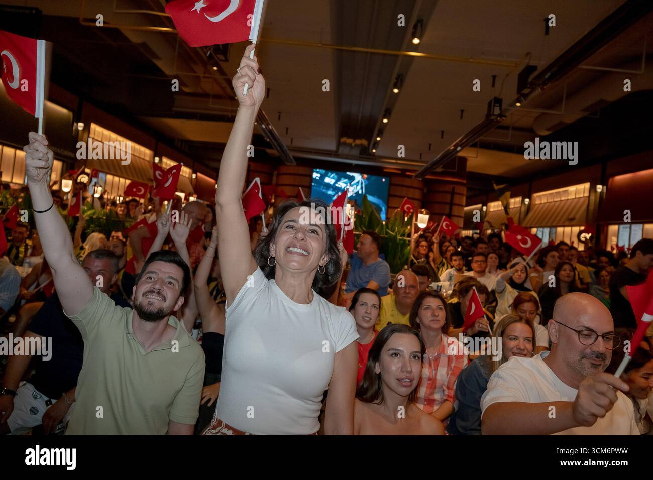 Turkish fans are seen following the match with great enthusiasm. The ...