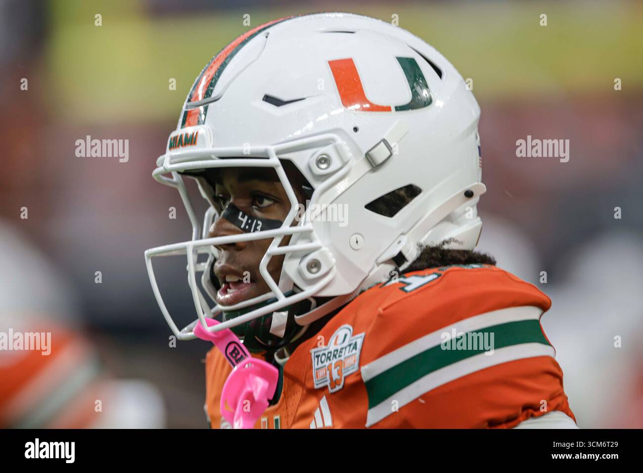 Miami, FL: Miami Hurricanes defensive back Bryce Fitzgerald (13) runs ...