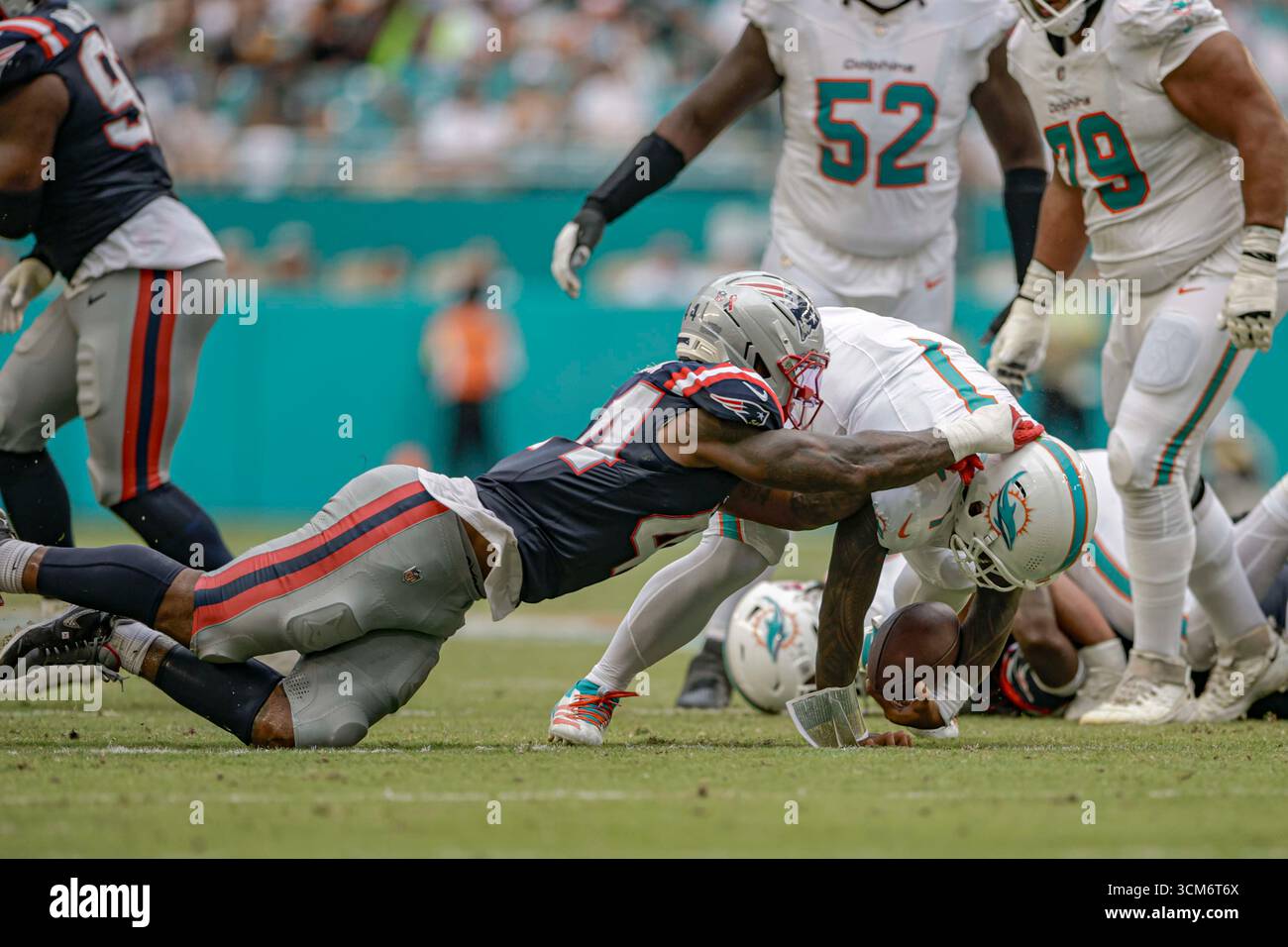 Miami Gardens, FL USA; Miami Dolphins quarterback Tua Tagovailoa (1) is ...