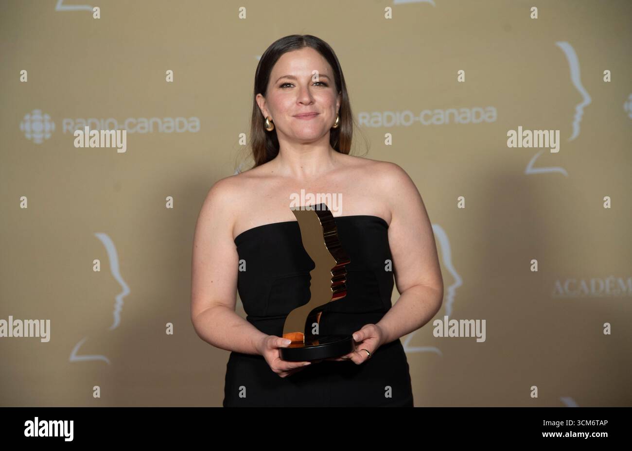 Pascale Renaud-Hebert with her trophy for Best Actress in a Leading ...
