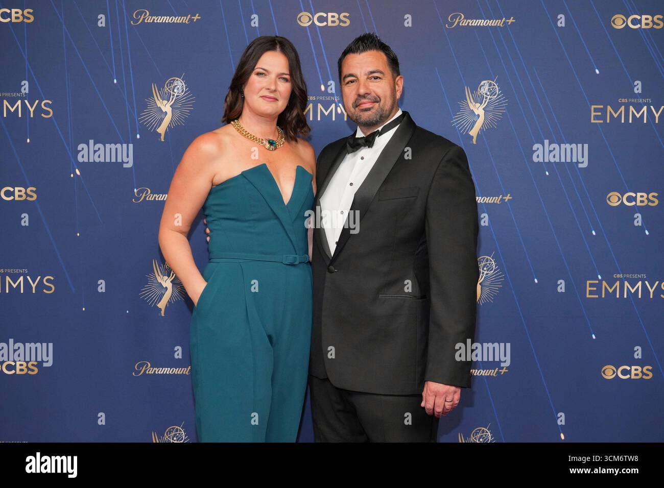 David Meanti, right, arrives at the 77th Emmy Awards on Sunday, Sept ...