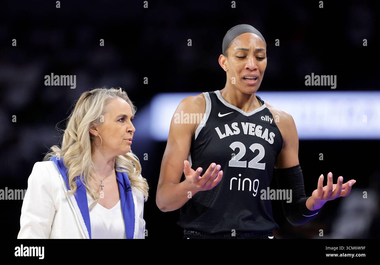 Las Vegas Aces center A'ja Wilson (22) talks with Aces head coach Becky ...