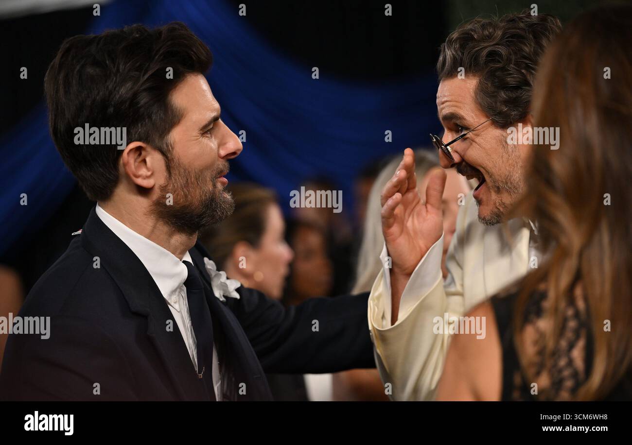(L-R): Adam Scott and Pedro Pascal arrive for the 77th annual Primetime Emmy Awards at the ...