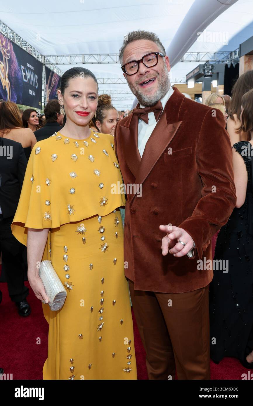 Lauren Miller and Seth Rogen walks the red carpet at the 77th Emmy ...
