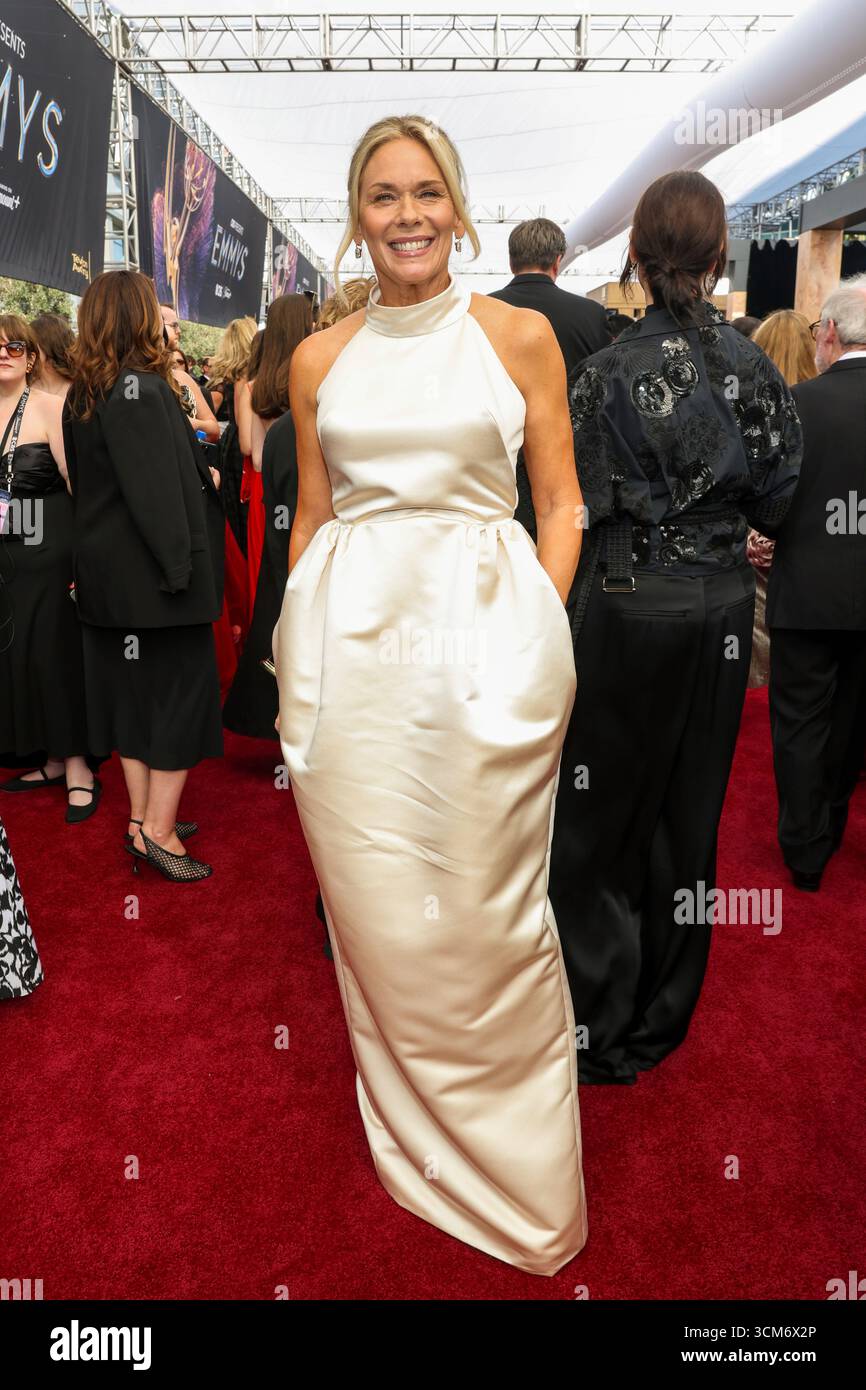 Leanne Morgan walks the red carpet at the 77th Emmy Awards on Sunday ...