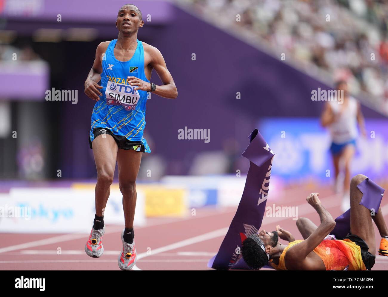 Tokyo, Japan. 15th Sep, 2025. Alphonce Felix Simbu of Tanzania (L) and ...