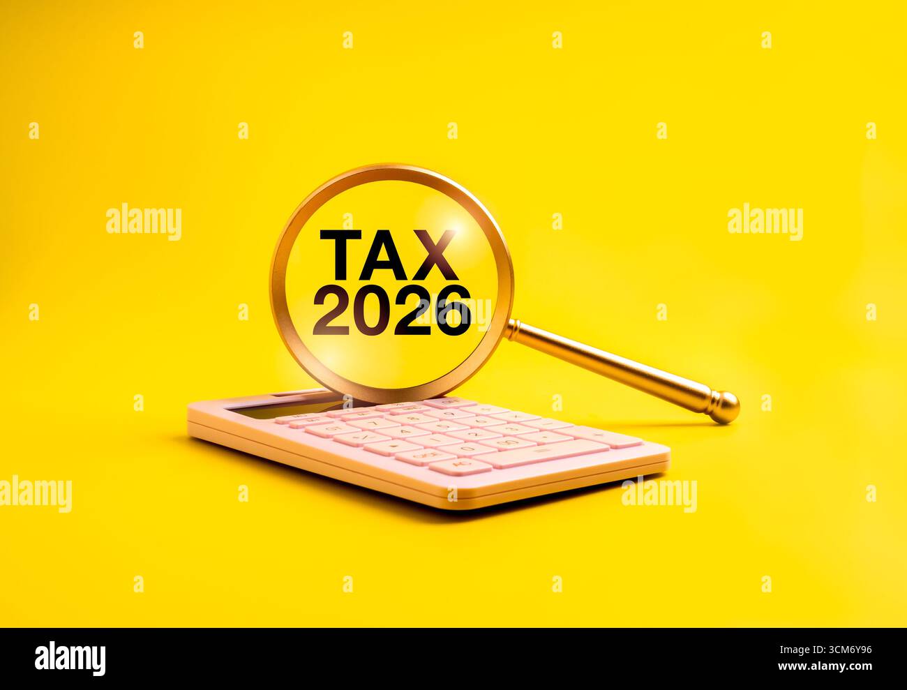 Tax 2026 concept with magnifying glass focusing on text over calculator ...