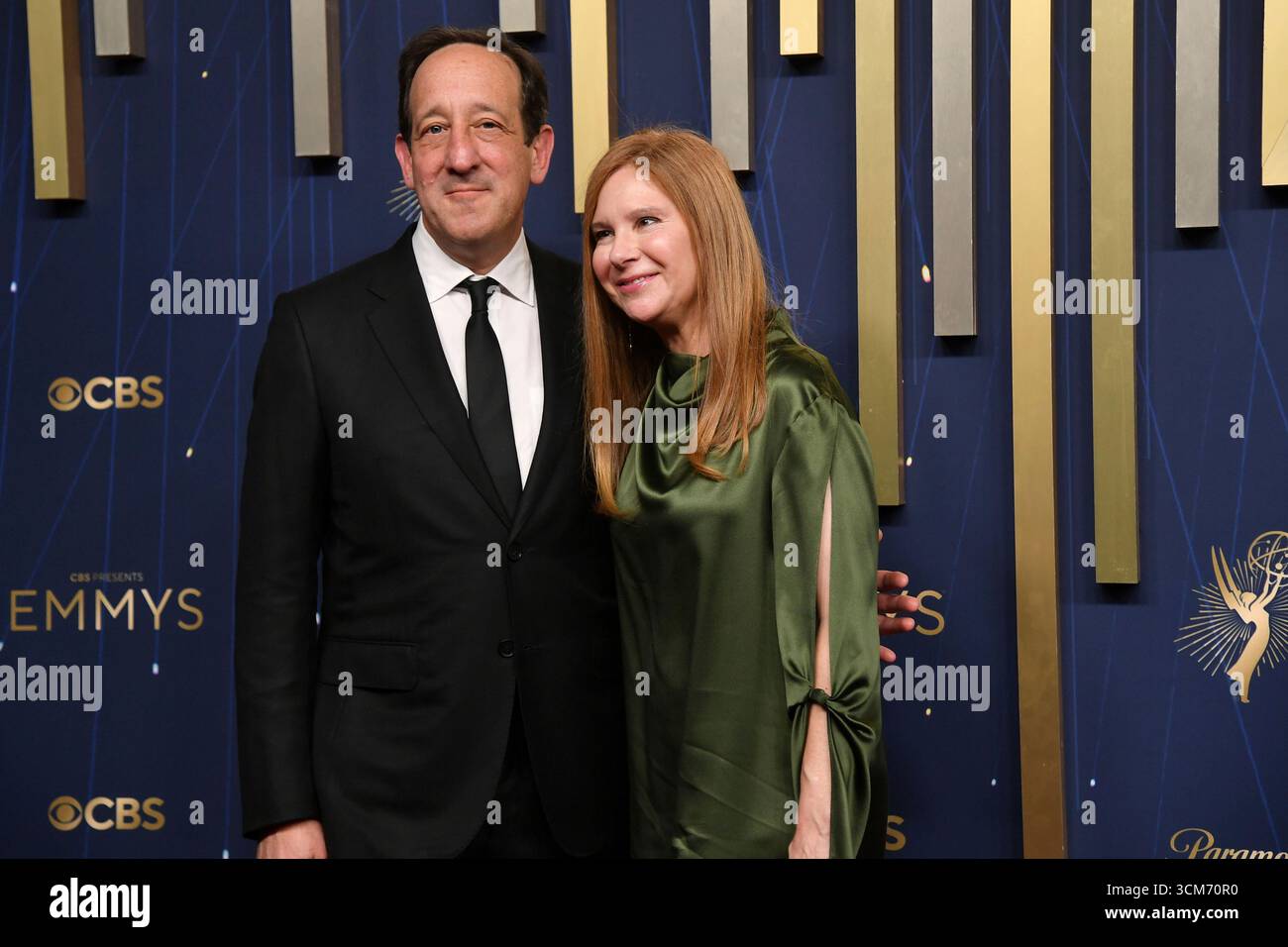 David Miner, left, and Jennifer Miner arrives at the 77th Primetime ...