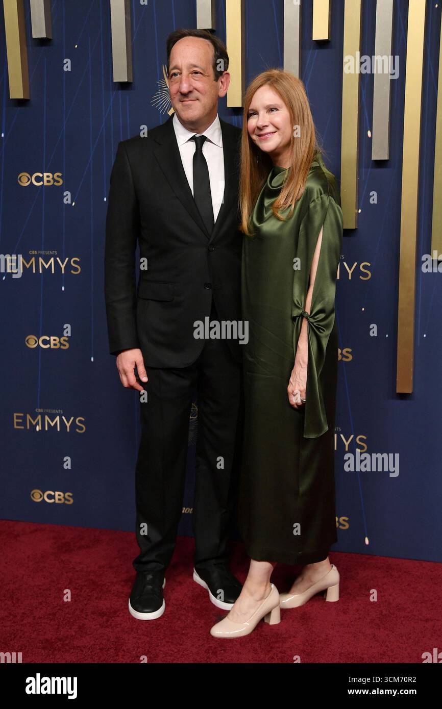 David Miner, left, and Jennifer Miner arrives at the 77th Primetime ...