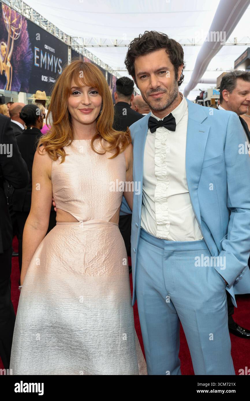 Leighton Meester and Adam Brody walk the red carpet at the 77th Emmy ...