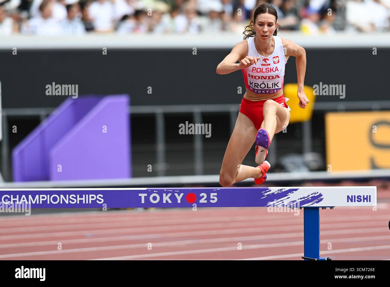 Kinka Krolik (Poland) during the 3000 metres steeplechase heat run ...