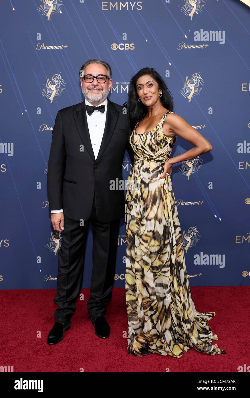 James Mangold, left, and Shini Wark arrive at the 77th Emmy Awards on ...