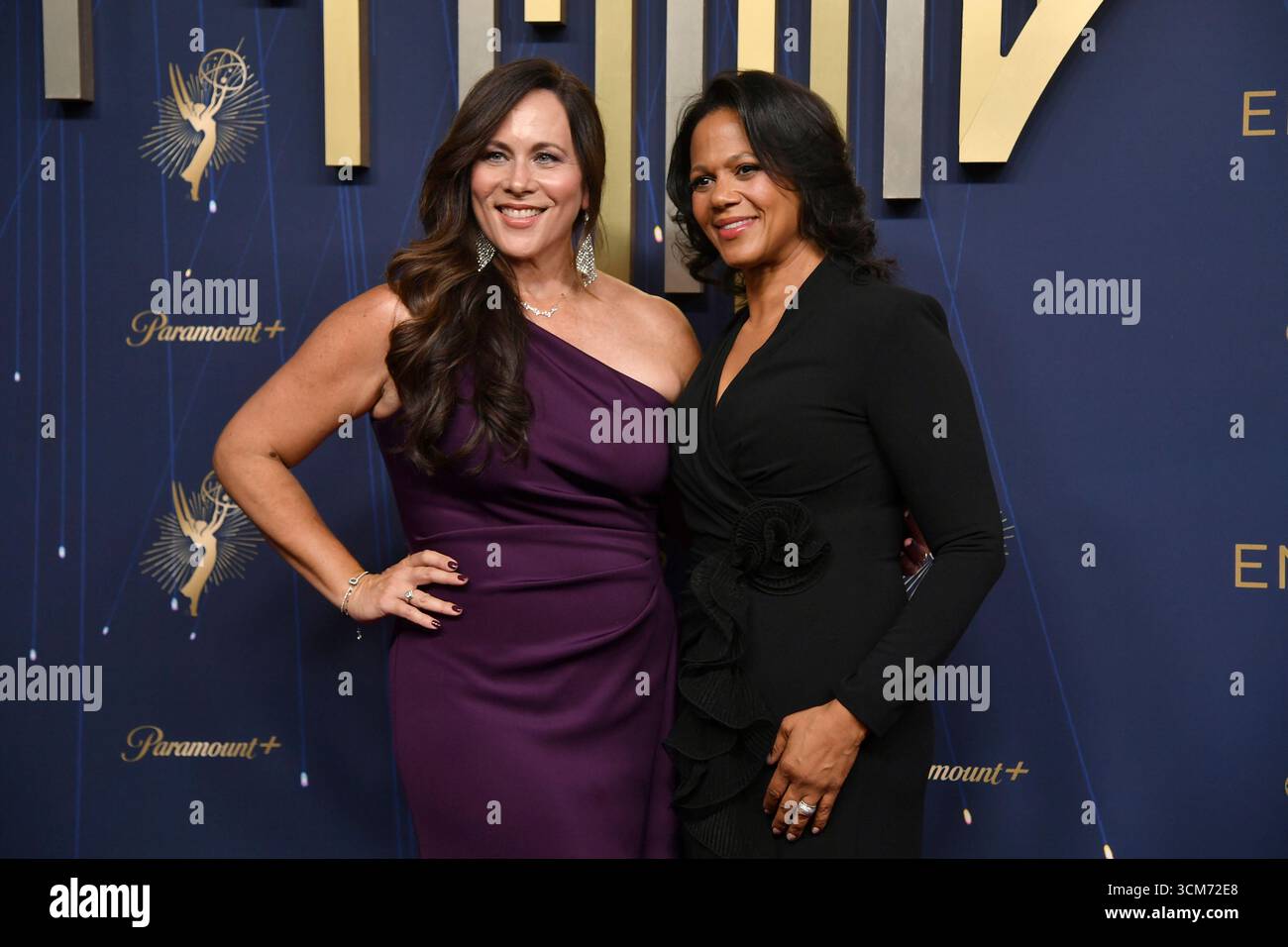 Anne Martinez Vasquez, left, and Tina Perry arrive at the 77th ...