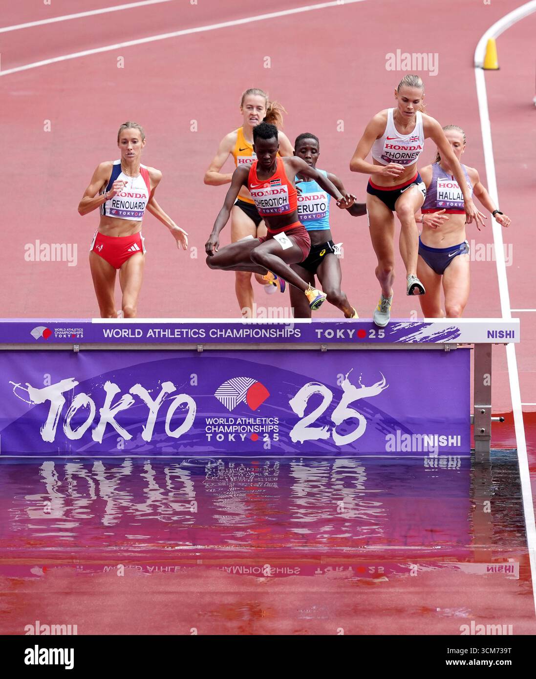 Great Britain's Elise Thorner (right) enters the water jump on her way to finishing third in the ...