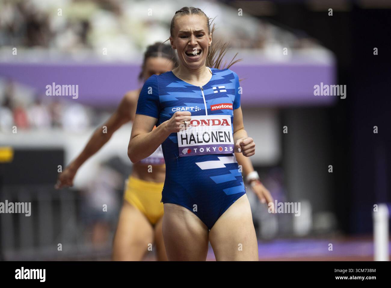 Kristiina Halonen of Finland competes in the women's 400m hurdles heats ...
