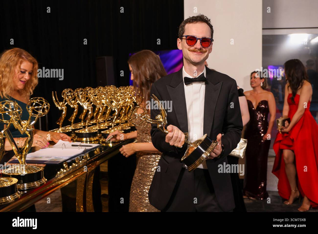 EXCLUSIVE - Christopher McDaniel picks up their official Emmy statuette ...
