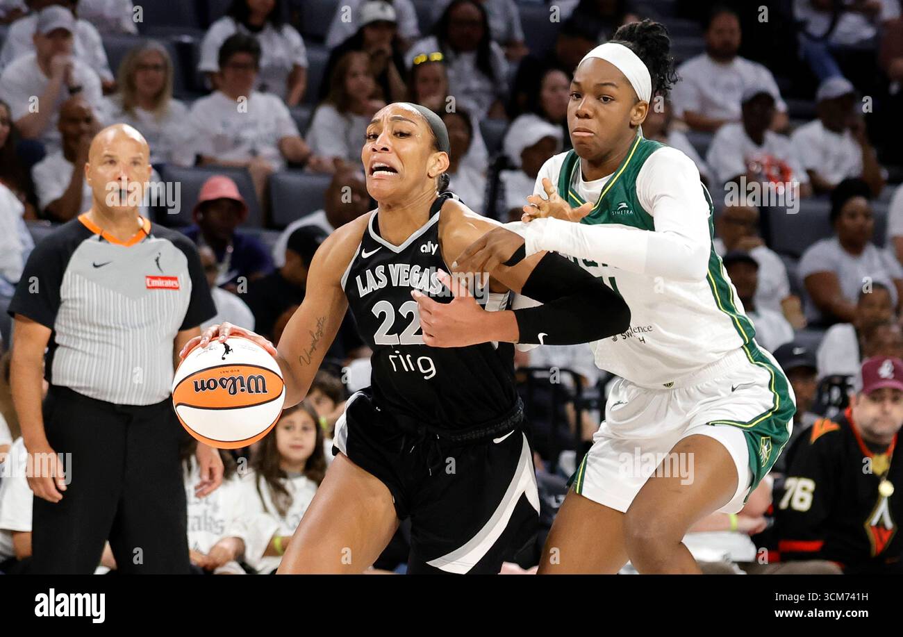 Las Vegas Aces center A'ja Wilson (22) drives past Seattle Storm center ...