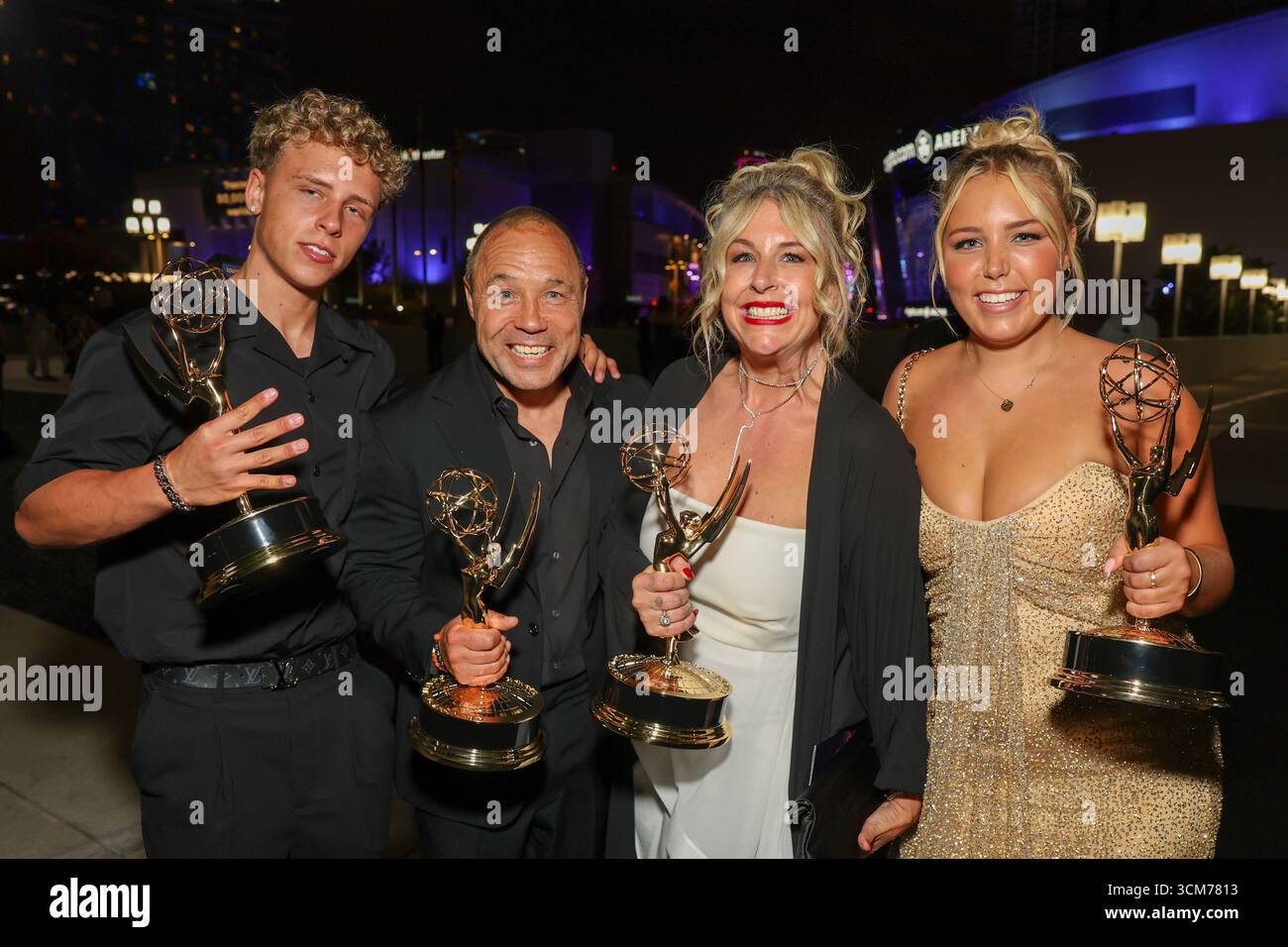 Alfie Graham, from left, Stephen Graham, Hannah Walters and Grace Graham enjoy the 77th Emmy ...
