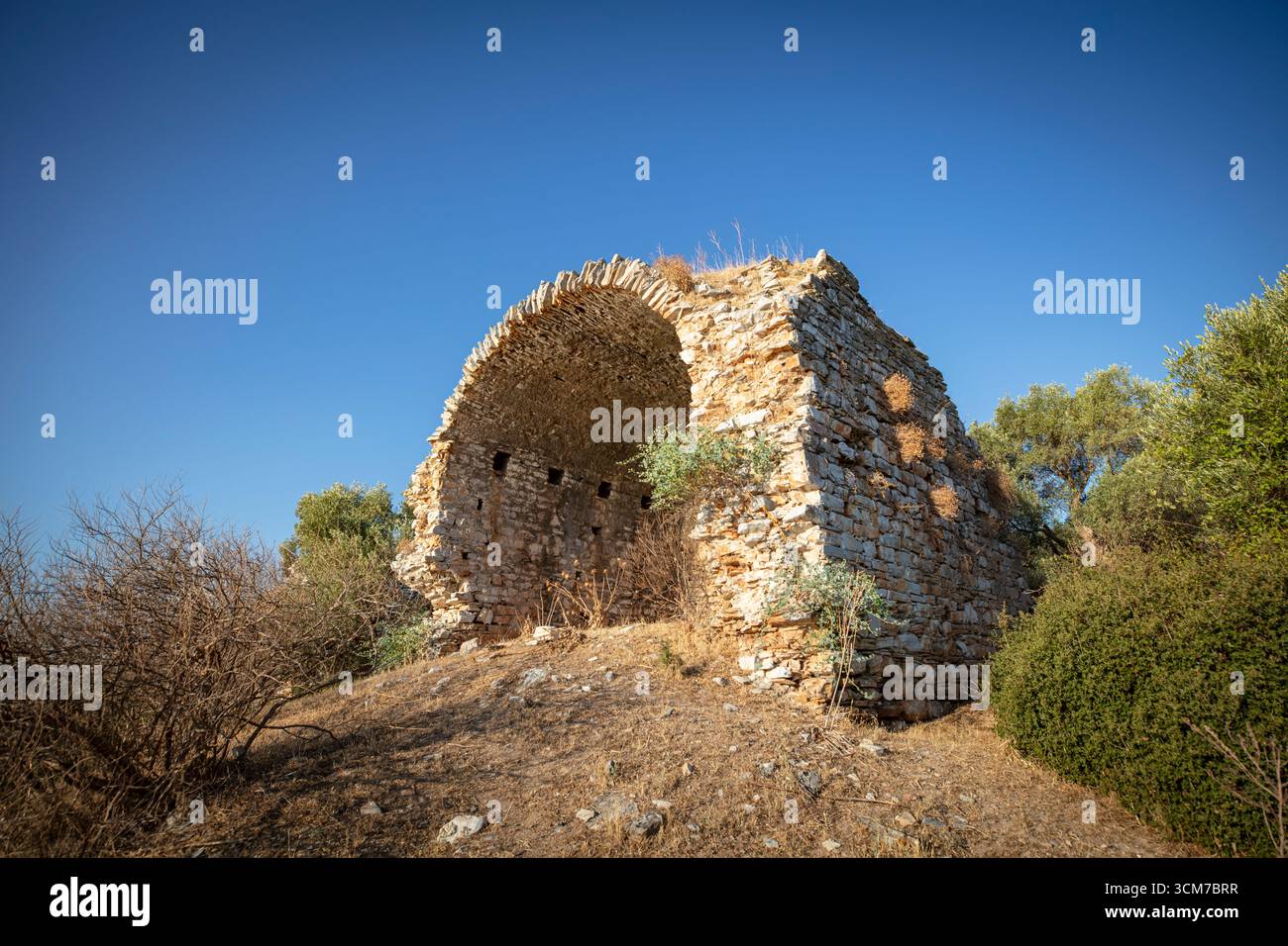 View of the ruins of Iasos Ancient City in the morning sun ...