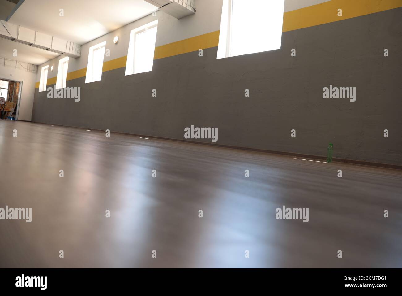 Empty studio with many windows, ground level view Stock Photo - Alamy