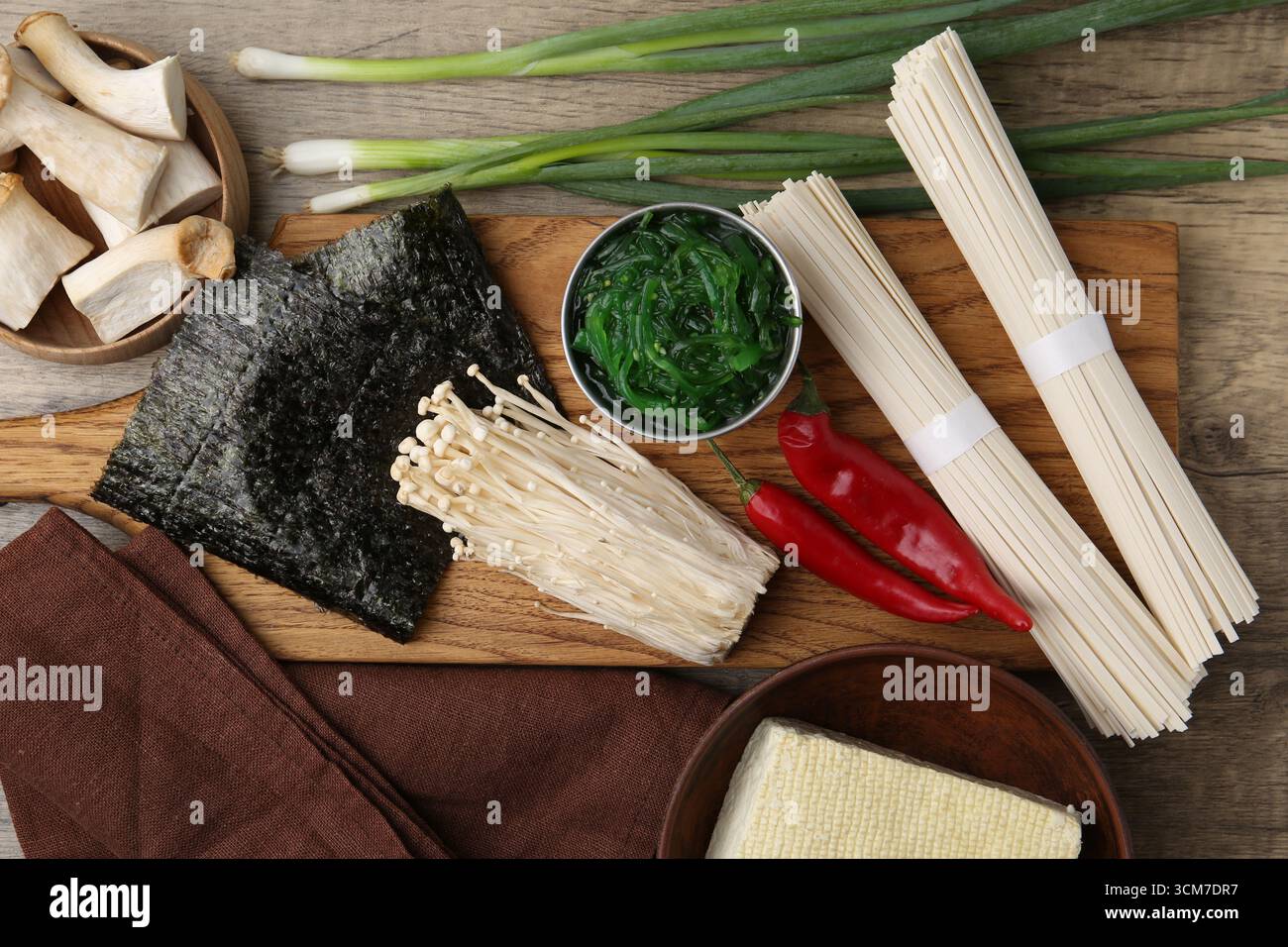 Enoki, king oyster (eryngii) mushrooms and other ingredients for ramen ...