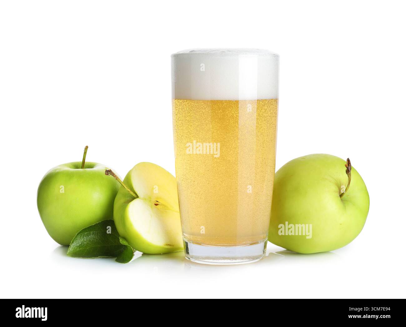 Tasty cider in glass, fresh apples and green leaves isolated on white ...