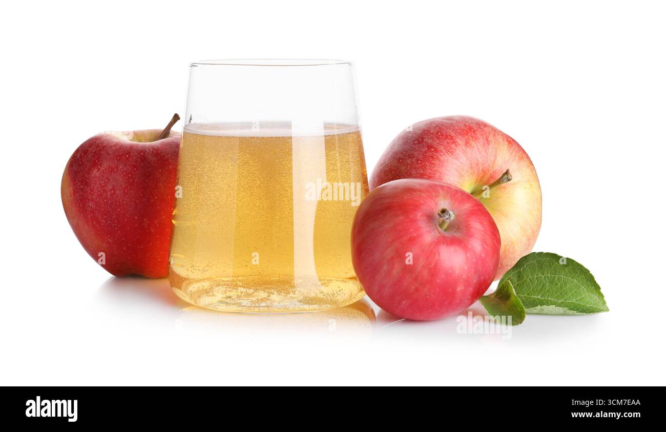 Tasty cider in glass, fresh apples and green leaves isolated on white ...