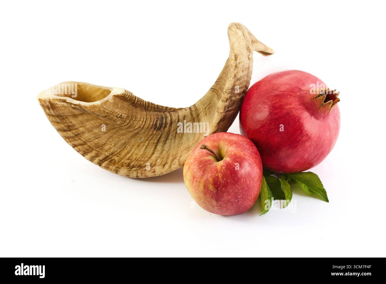 Rosh Hashanah. A shofar, apple, and pomegranate symbolize Rosh Hashanah ...