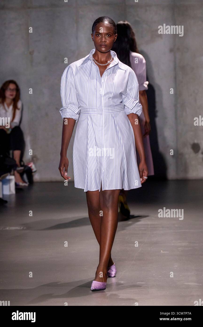 A model walks the runway for the Bach Mai fashion show during the ...
