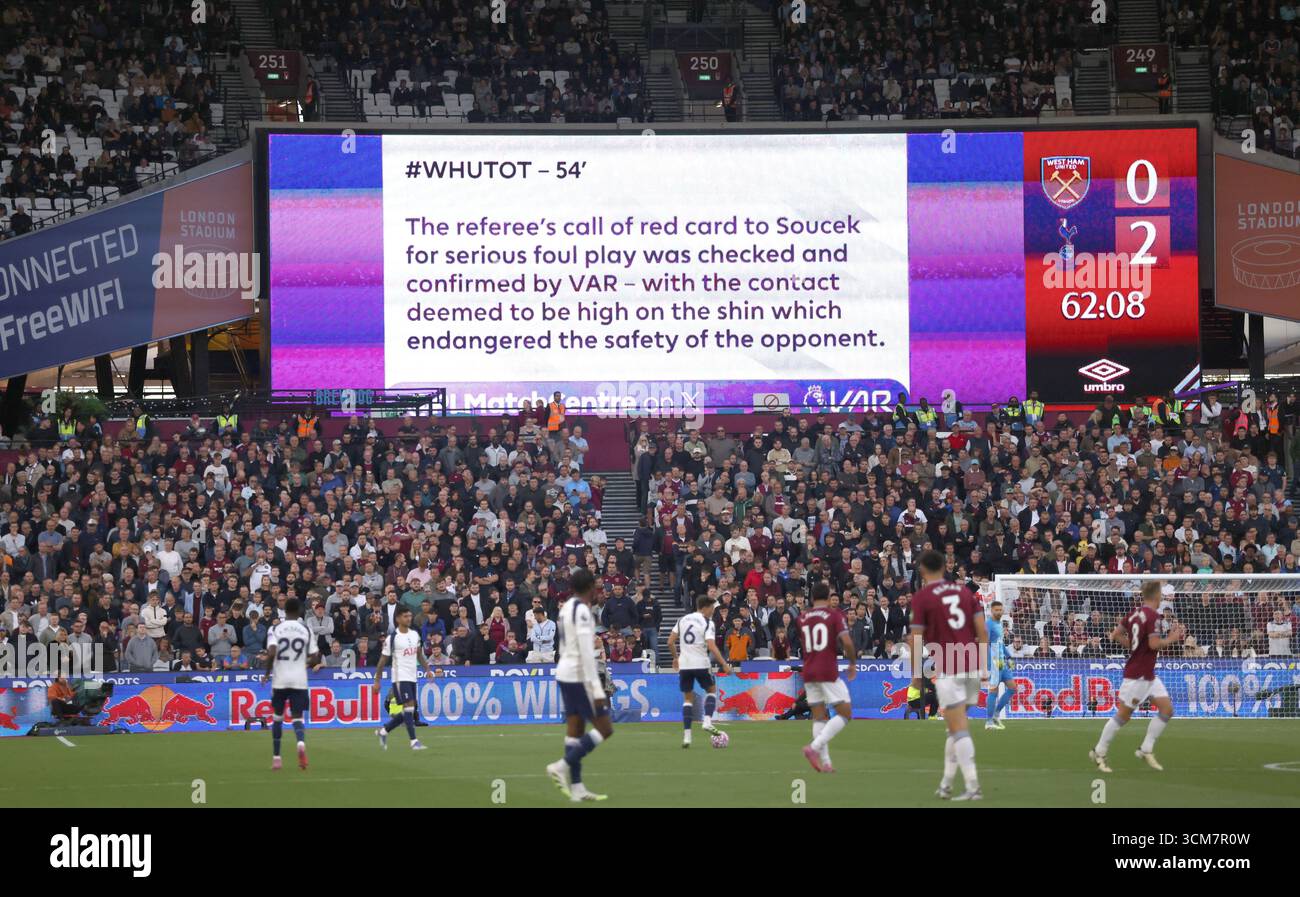 Electronics scoreboard shows the referee’s decision to give Tomas ...