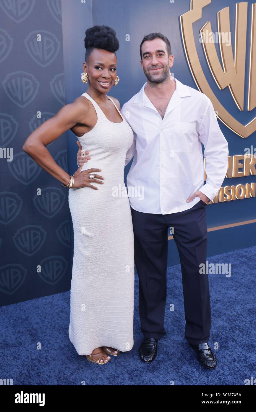 Tamberla Perry and Michael Grassi attend the Warner Bros. Television ...