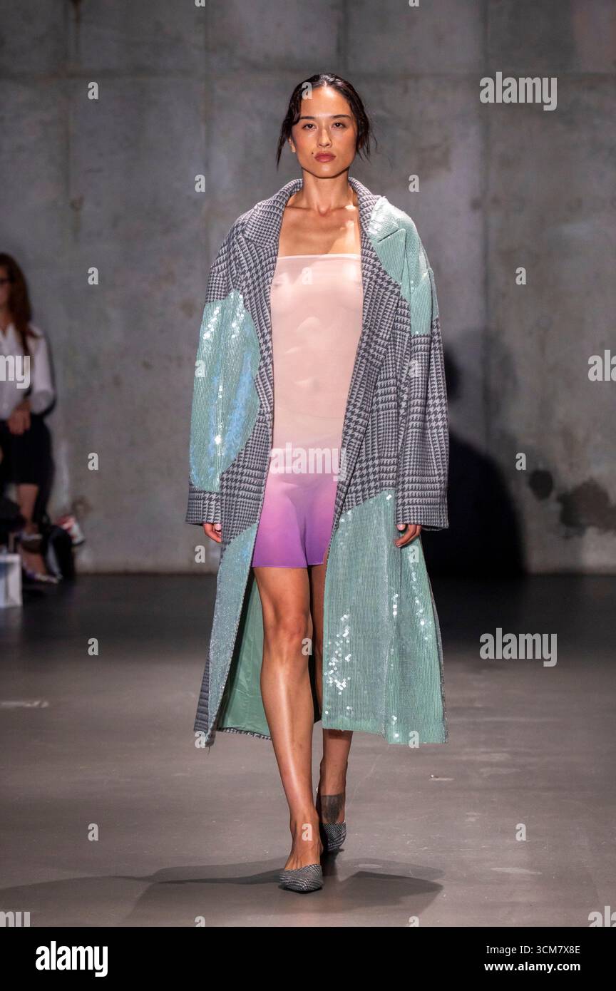 A model walks the runway for the Bach Mai fashion show during the ...