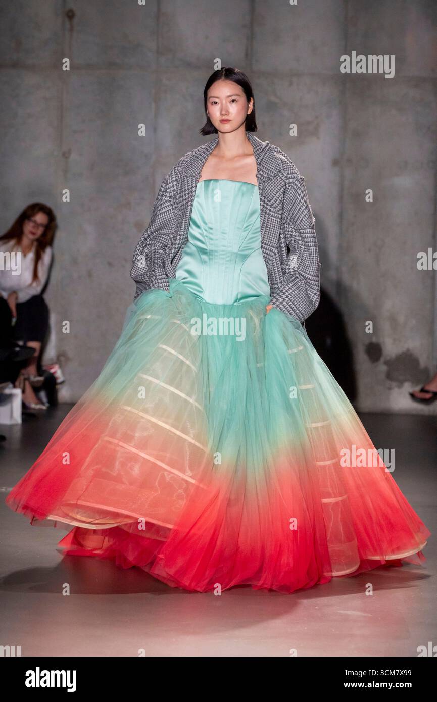 A model walks the runway for the Bach Mai fashion show during the ...