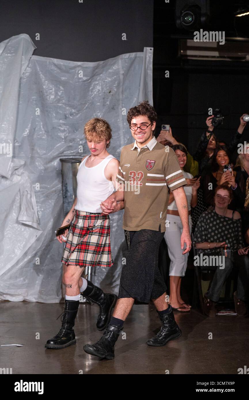 Gabe Gordon (R) walks the runway finale for the Gabe Gordon fashion ...