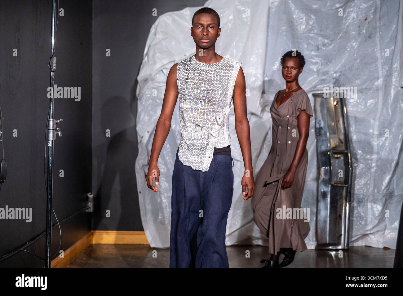 Models walk the runway finale for the Gabe Gordon fashion show during ...