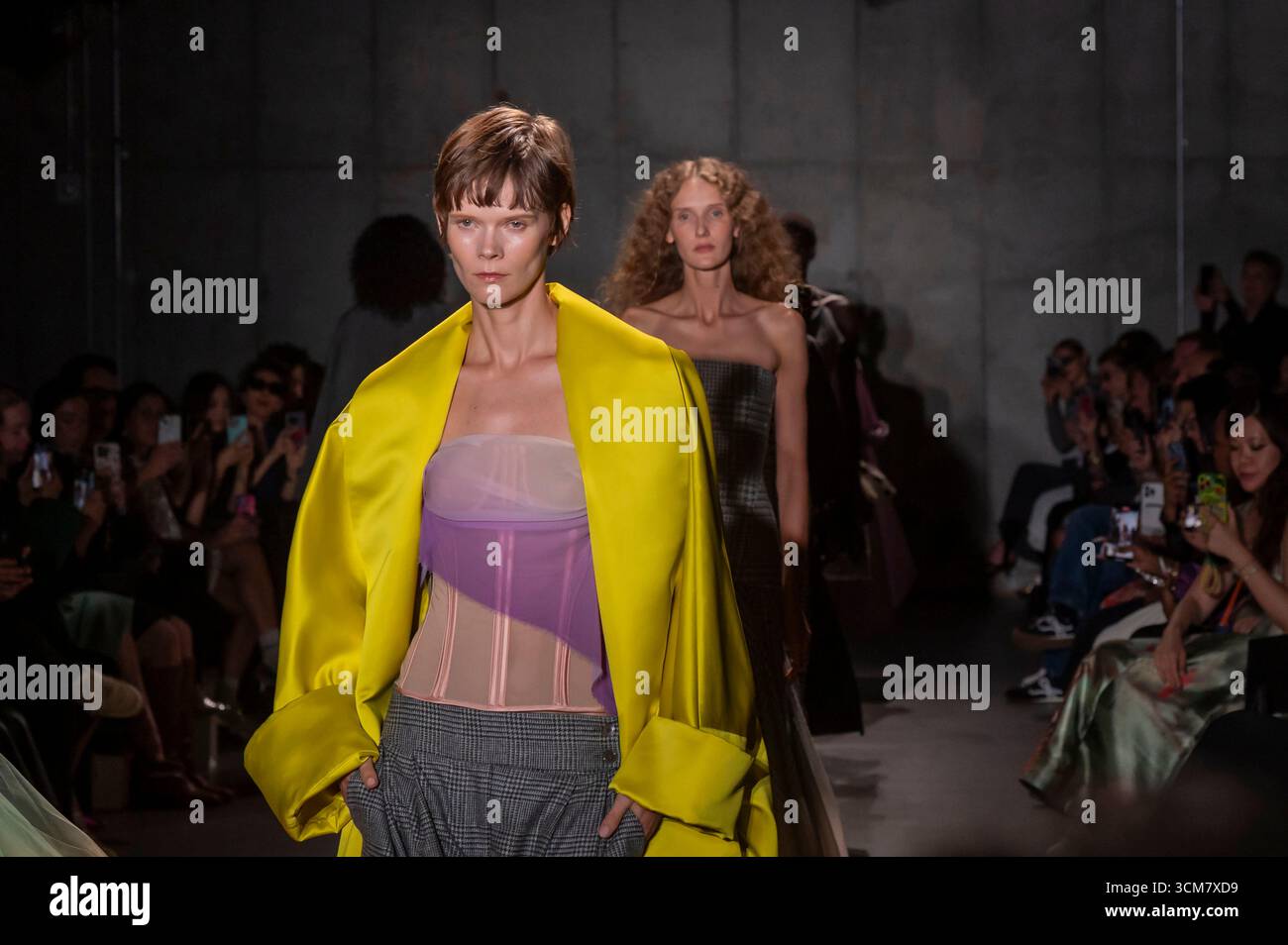 Models walk the runway finale for the Bach Mai fashion show during the ...