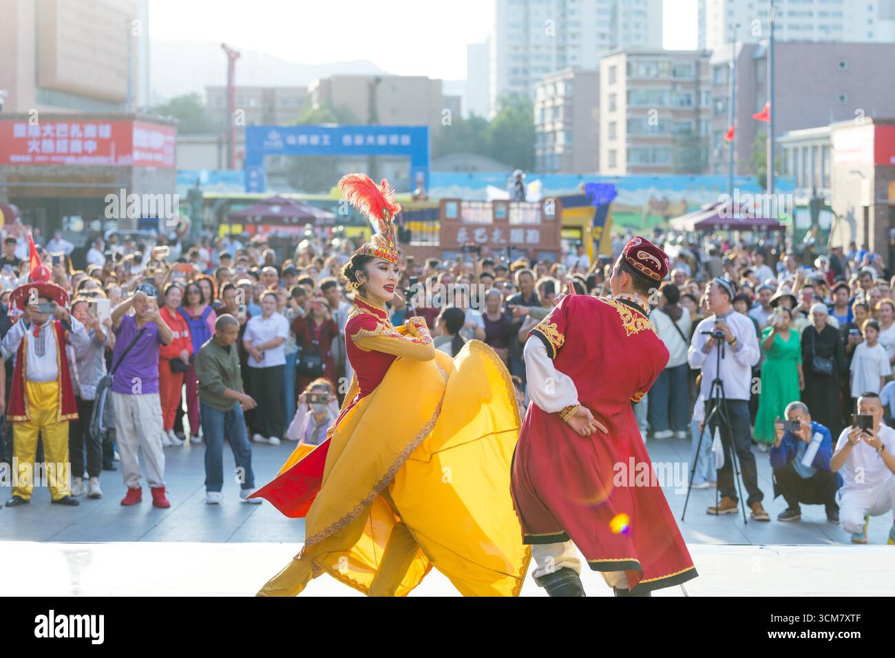 Tourists visit the Grand Bazaar in Urumqi City, northwest China's ...