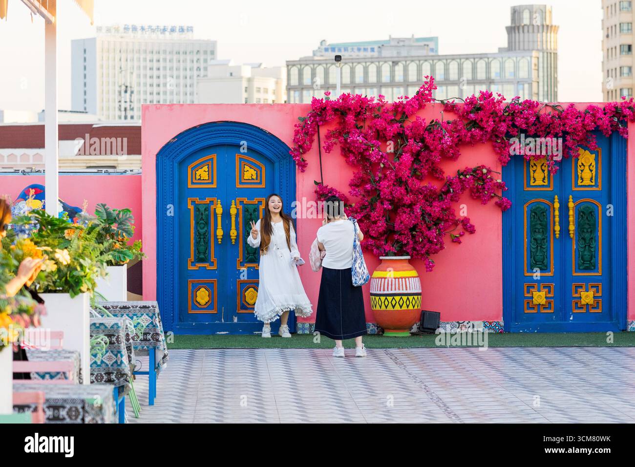 Tourists visit the Grand Bazaar in Urumqi City, northwest China's ...