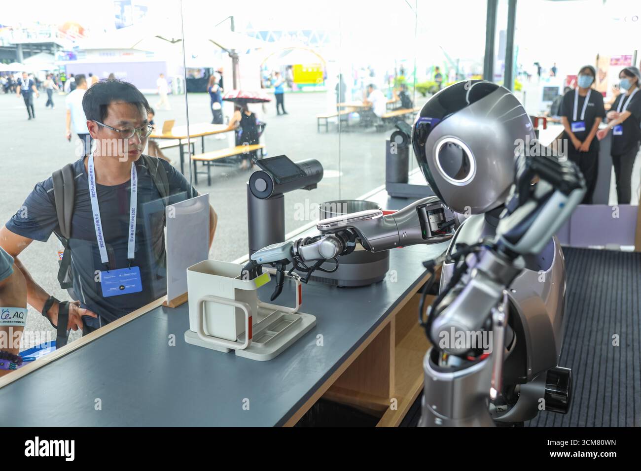 Robot chefs make debut at the 2025 Inclusion Conference on the Bund in ...