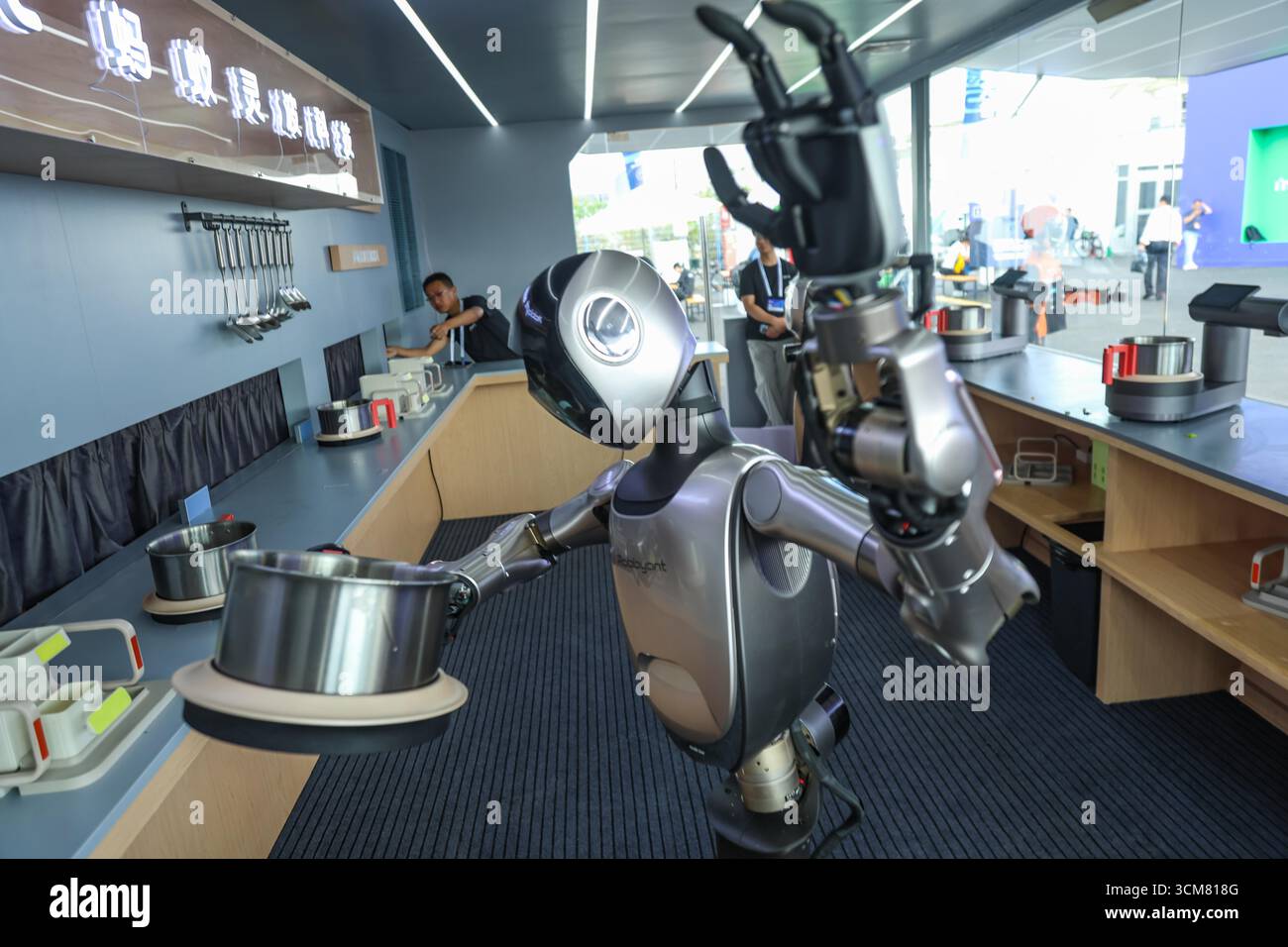 Robot chefs make debut at the 2025 Inclusion Conference on the Bund in ...
