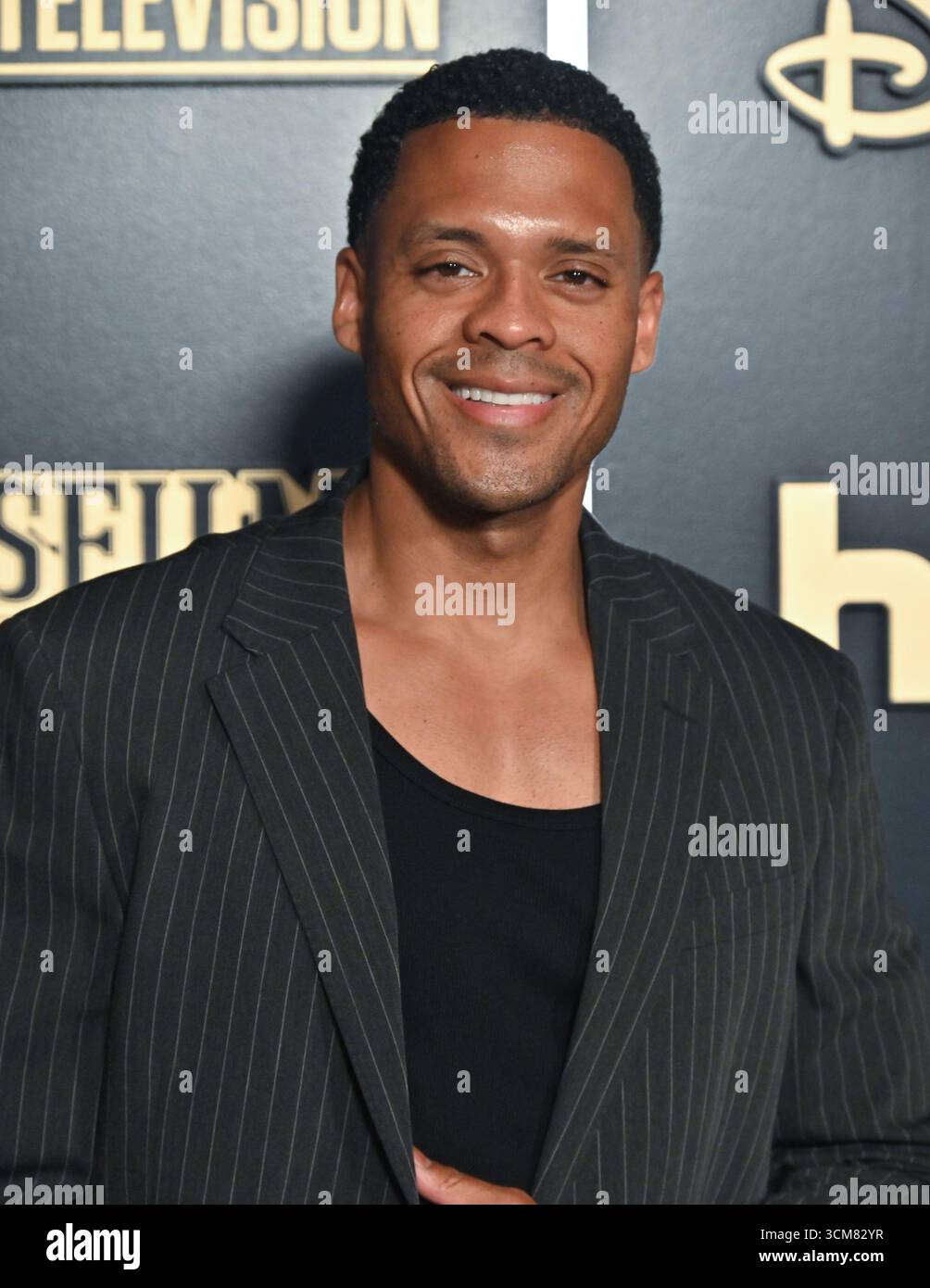 Deric Augustine at arrivals for The Walt Disney Company s Emmy Awards ...