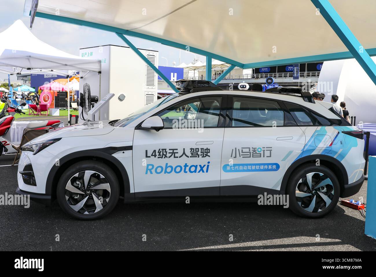 People visit the 2025 Inclusion Conference on the Bund in Shanghai ...