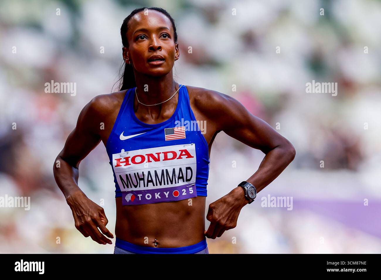 Dalilah Muhammad of United States of America looks on after competing ...