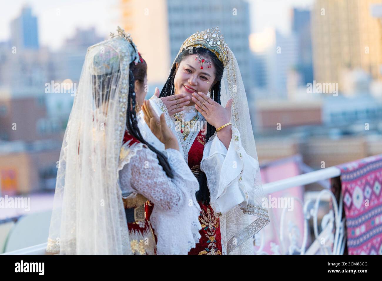 Tourists visit the Grand Bazaar in Urumqi City, northwest China's ...